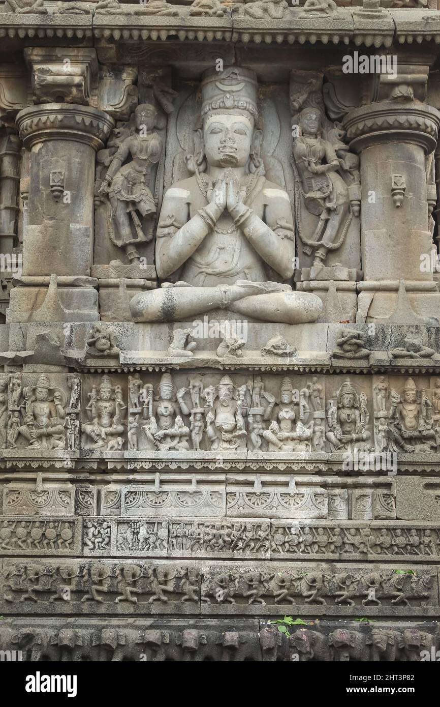 Vertical shot of the stone sculpture of Lord Shiva in Dhyan Position ...