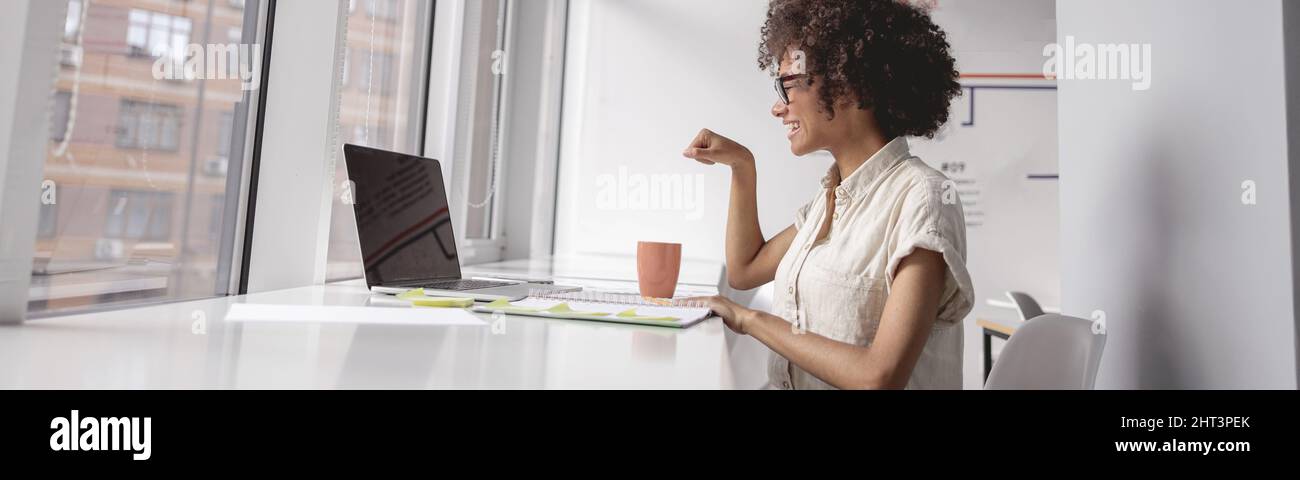 Smiling woman using sign language with colleagues and friends Stock ...