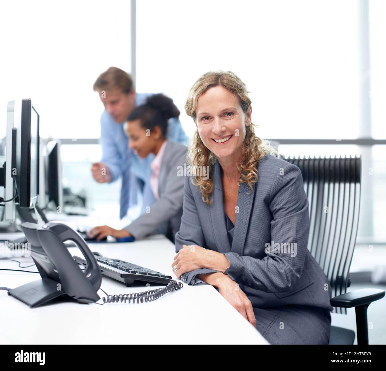 Breaking new ground in the corporate world. Positive businesswoman ...