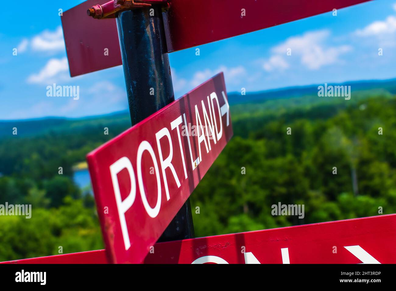 Painted red "Portland" road sign Stock Photo - Alamy