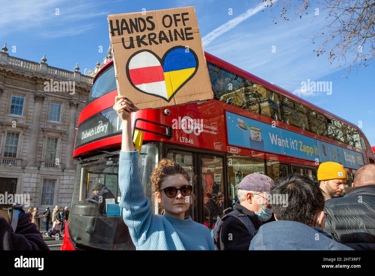 A Protester holds a placard expressing her opinion during a Ukraine ...