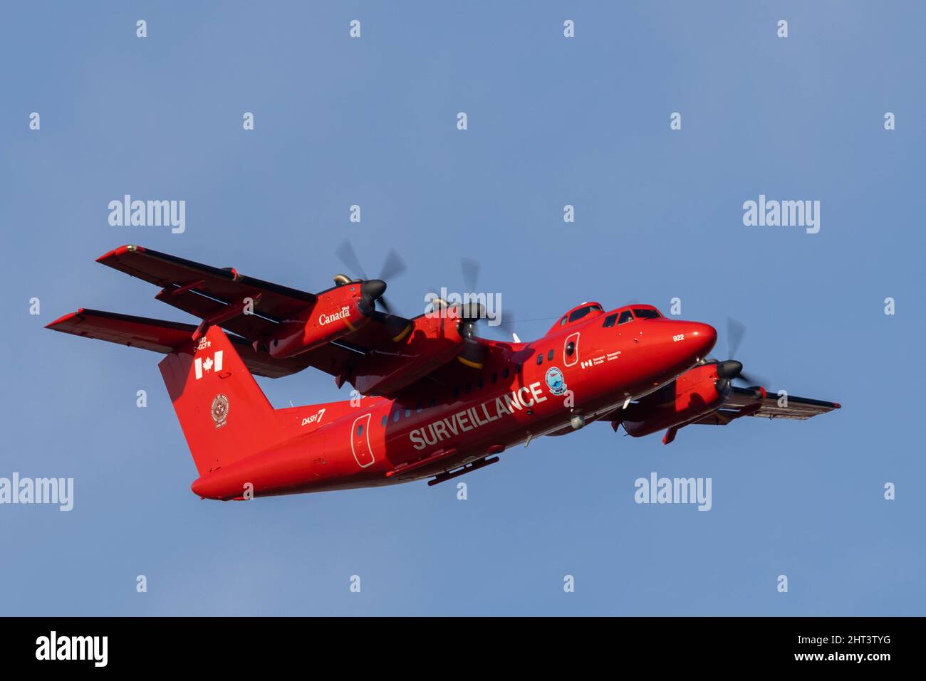 The DHC-7-150 Dash 7 climbing out at YOW airport in Ottawa Stock Photo ...