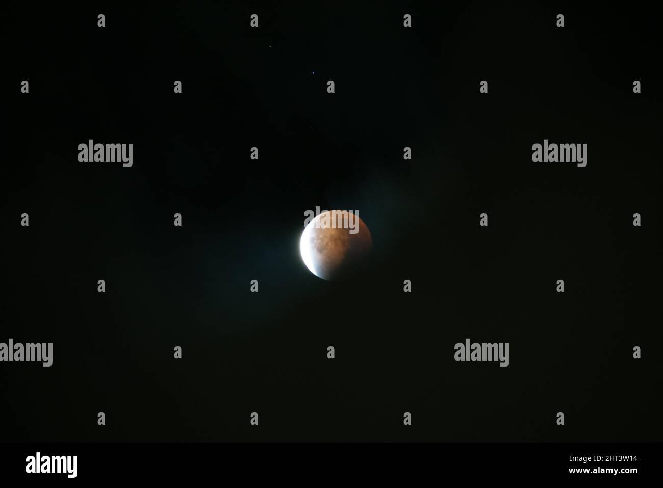 Beautiful lunar eclipse in a dark sky Stock Photo - Alamy