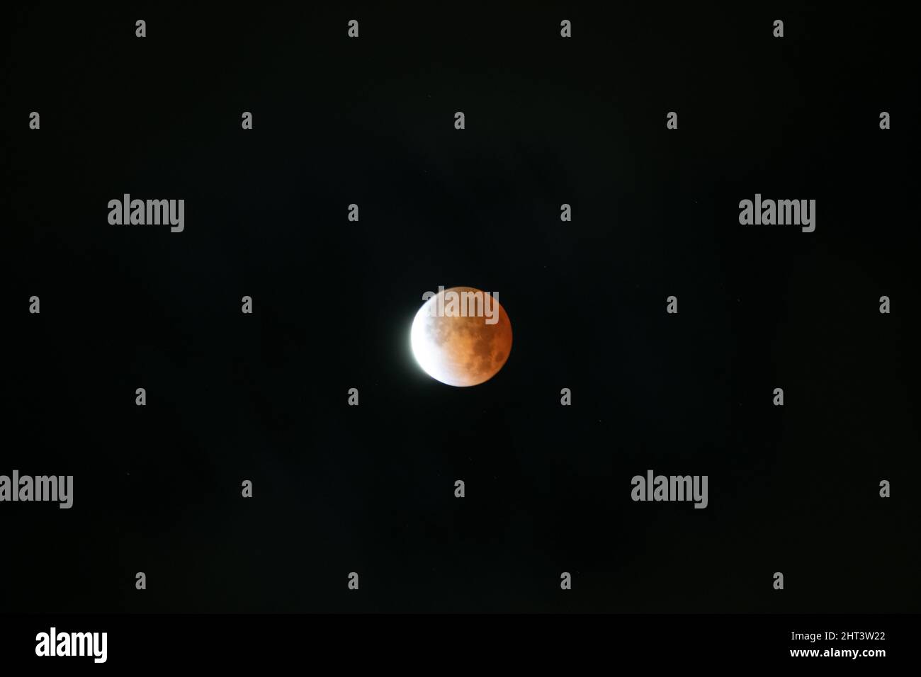 Beautiful lunar eclipse in a dark sky Stock Photo - Alamy