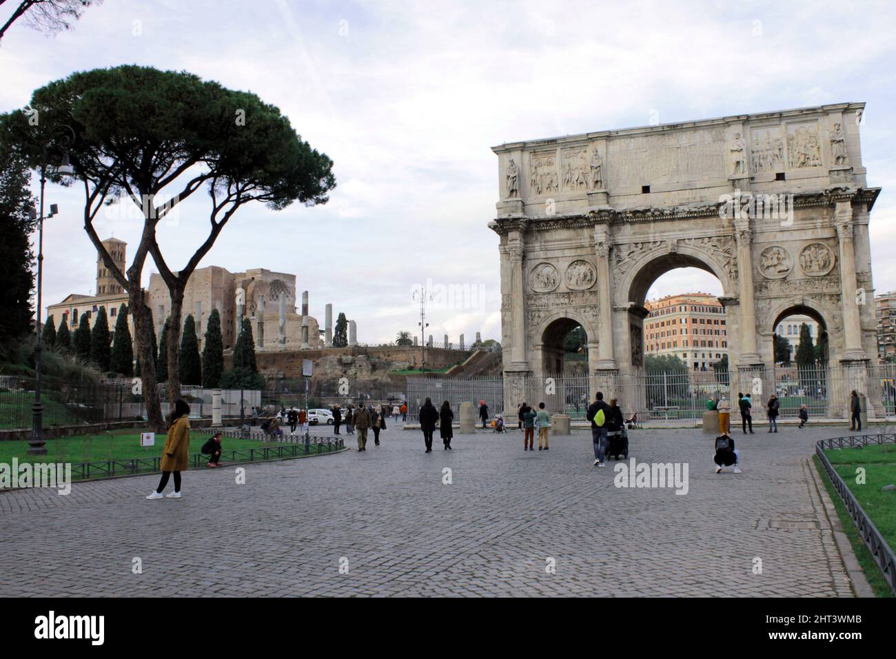 Low angle panoramic view of the Arch of Constantine and in the distance ...