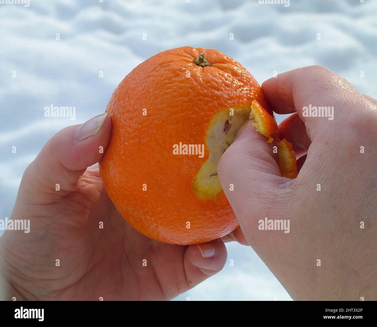 Orange is peeled Stock Photo - Alamy