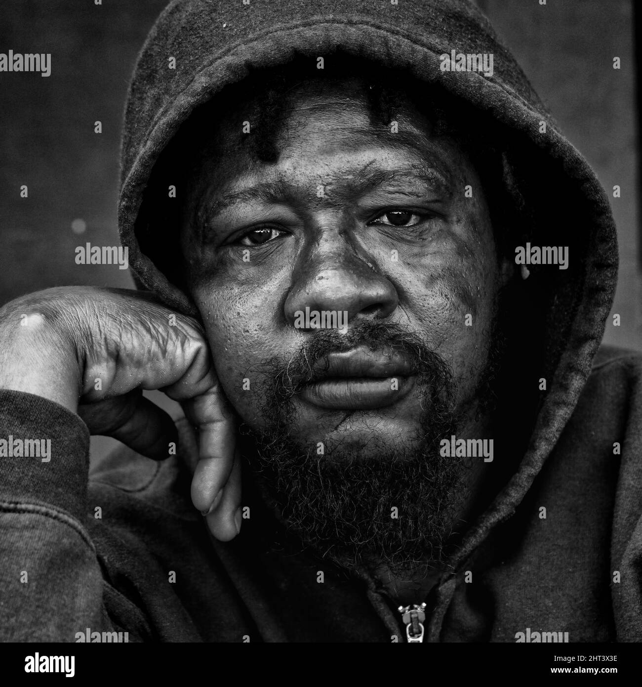 Grayscale portrait of a homeless person on the streets of Milwaukee ...