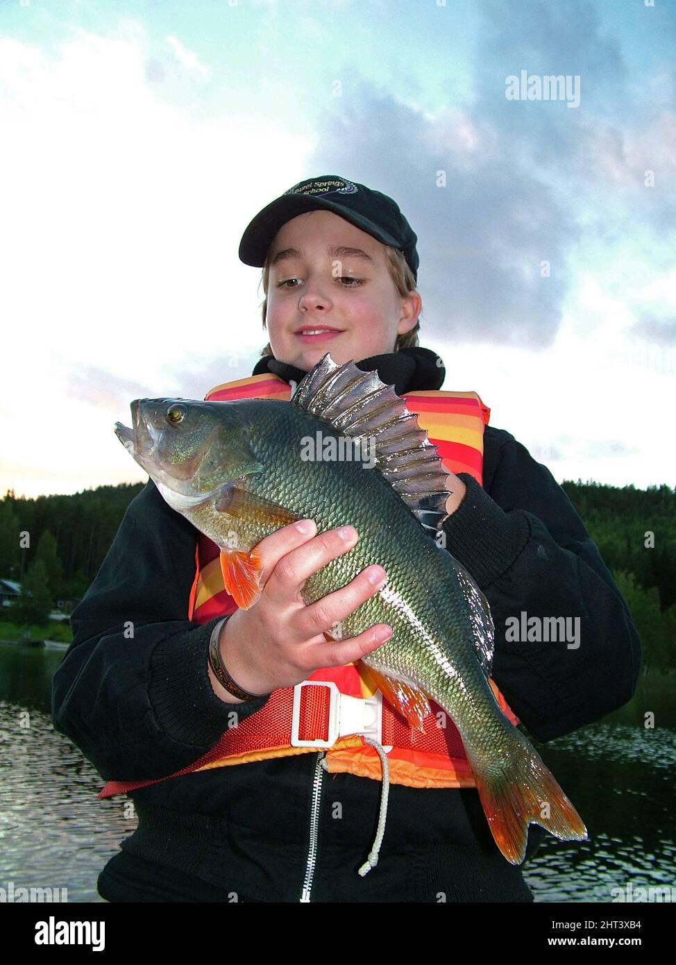 Boy catches fish hi-res stock photography and images - Alamy