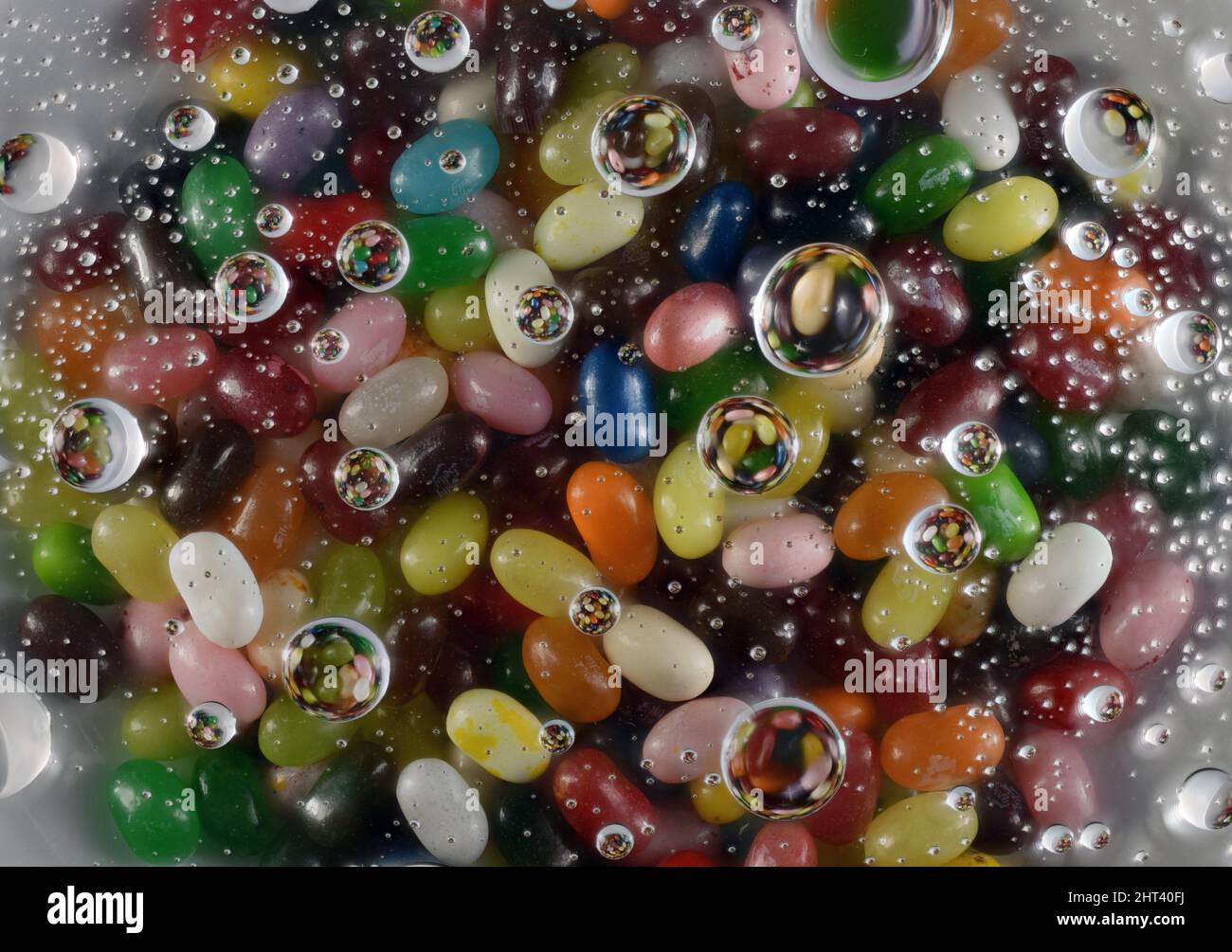 Water drops on Jelly Bean Background Stock Photo - Alamy
