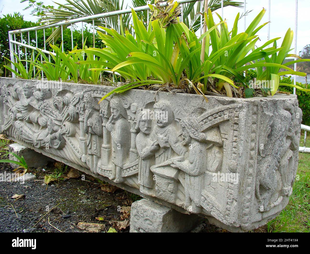 Sculptured flower vase with medieval themes Stock Photo - Alamy