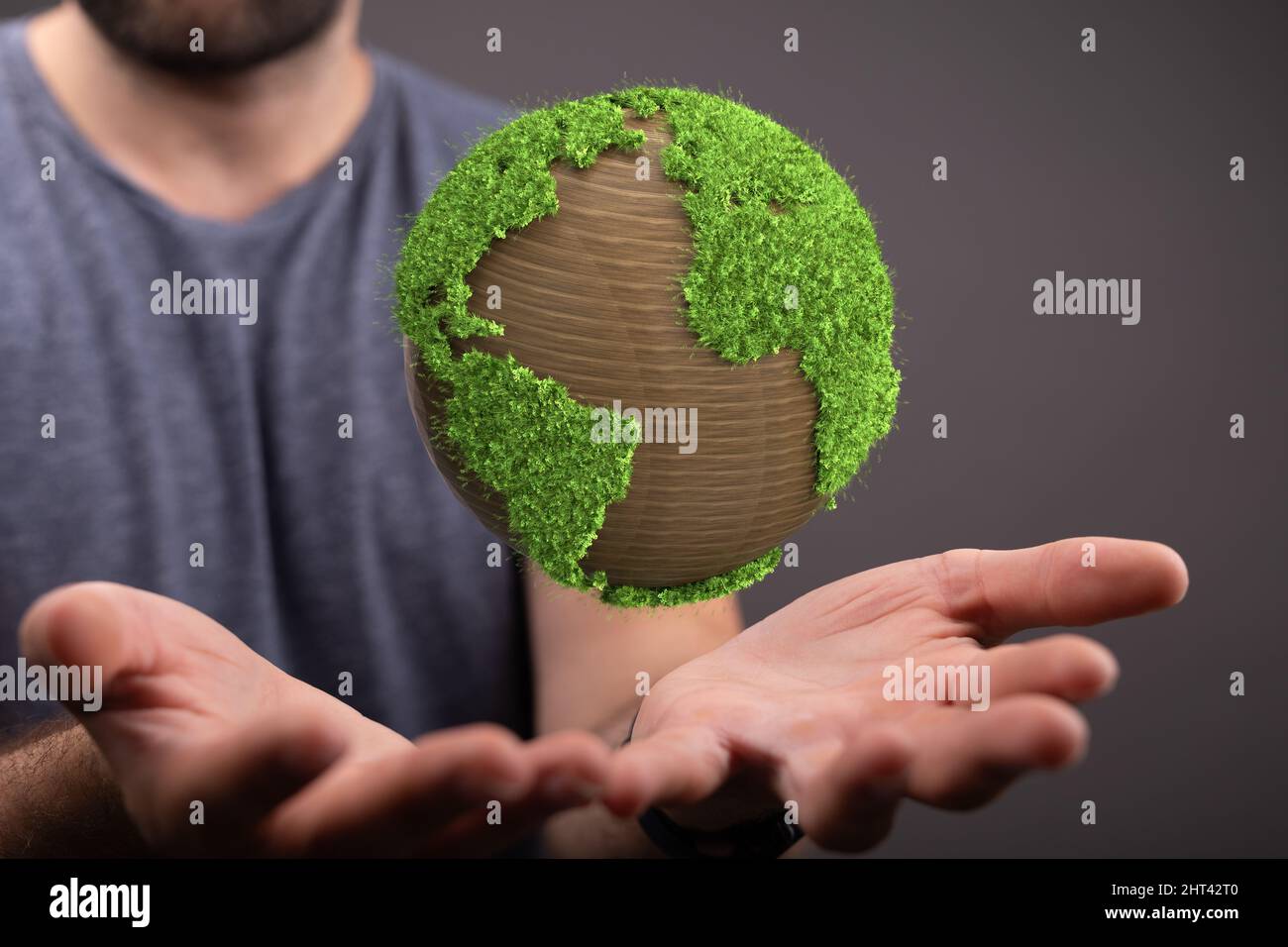 Caucasian man hand holding green 3D earth planet, ecology and green ...