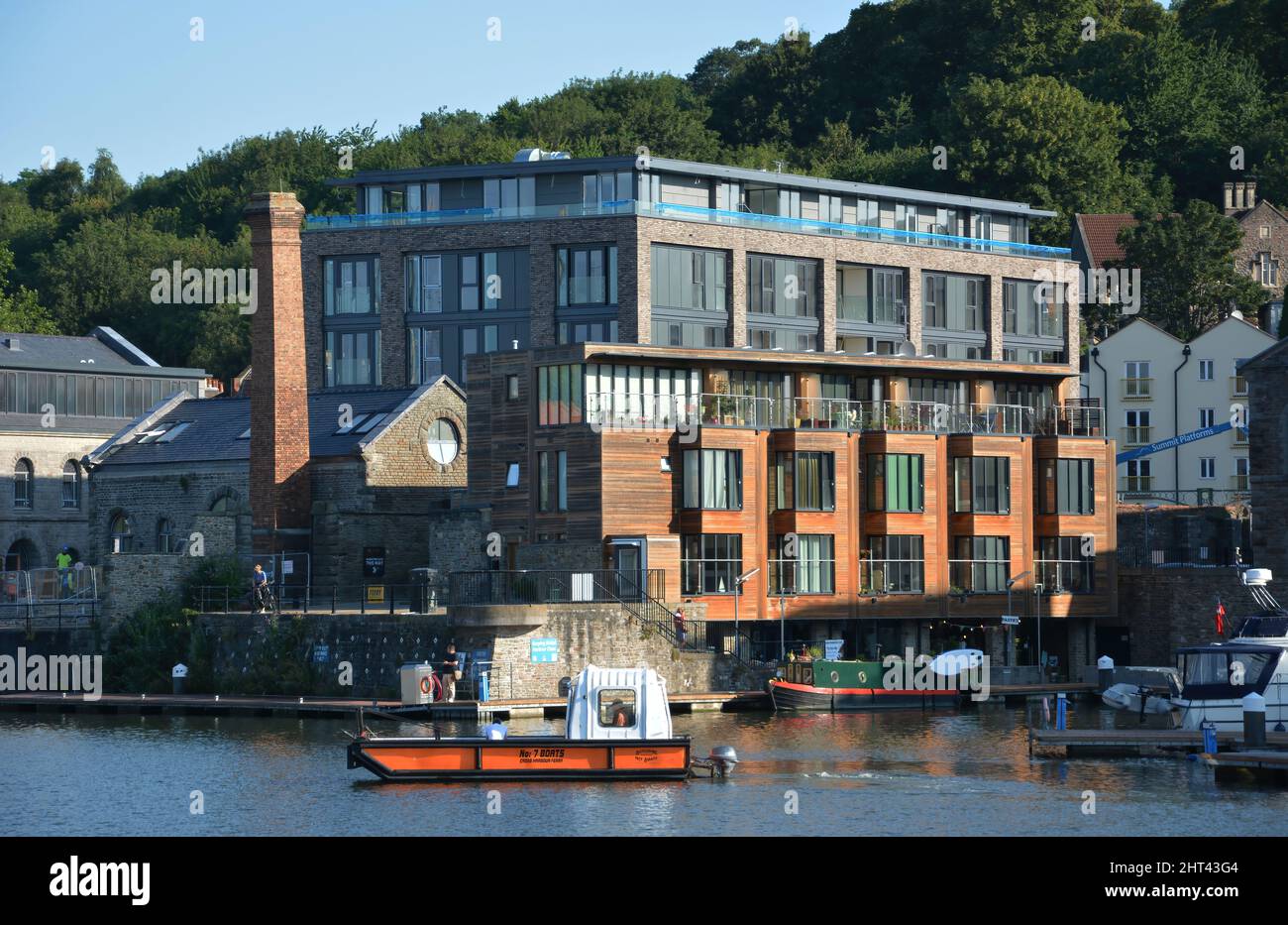 Small cross-harbor ferry on the waterfront at Brunel Quay, Bristol ...