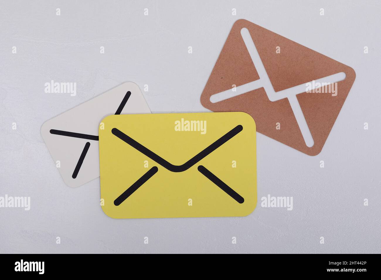 Email or letter signs on a white background Stock Photo - Alamy