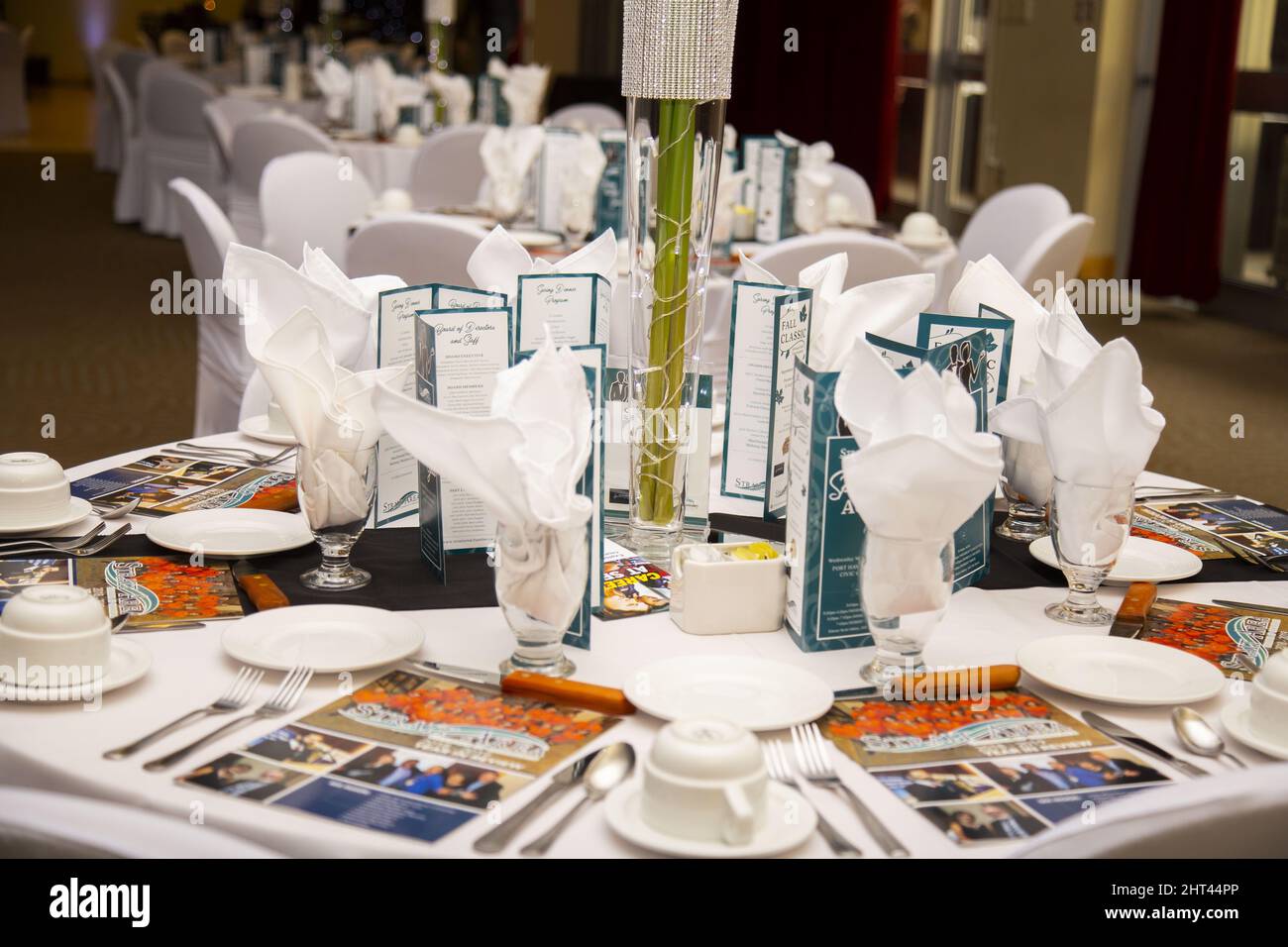 Closeup of a white banquet table Stock Photo - Alamy