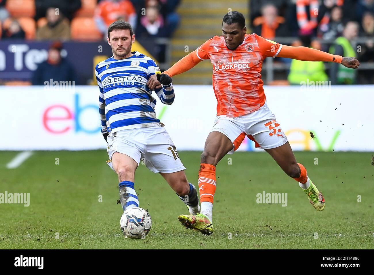 Dujon Sterling #35 of Blackpool and John Swift #10 of Reading battles ...