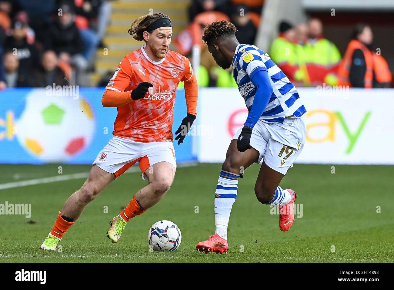 Josh Bowler #11 of Blackpool takes on Tom Dele-Bashiru #19 of Reading ...