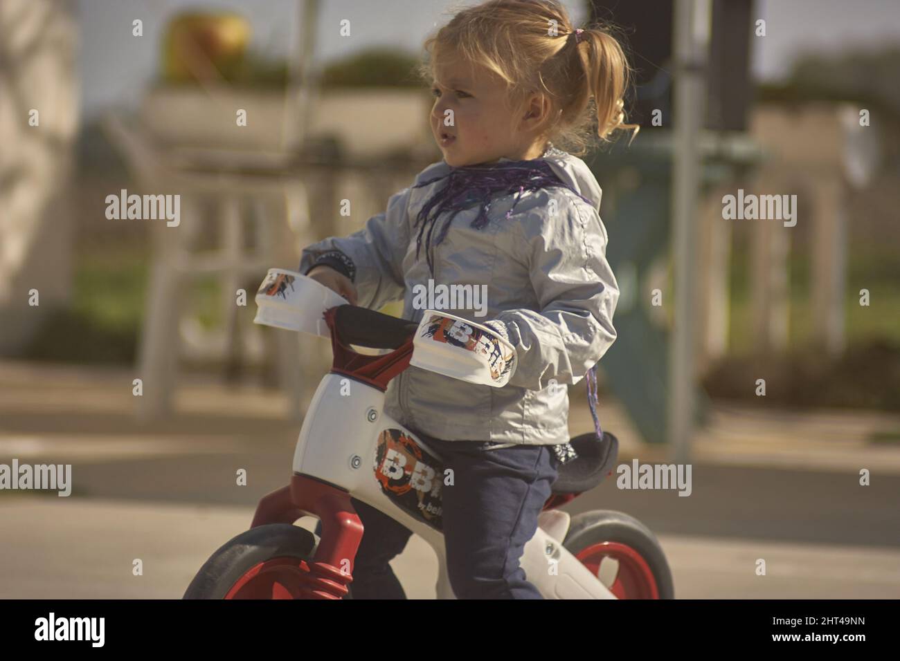 Female toddler tricycle trike hi-res stock photography and images - Alamy