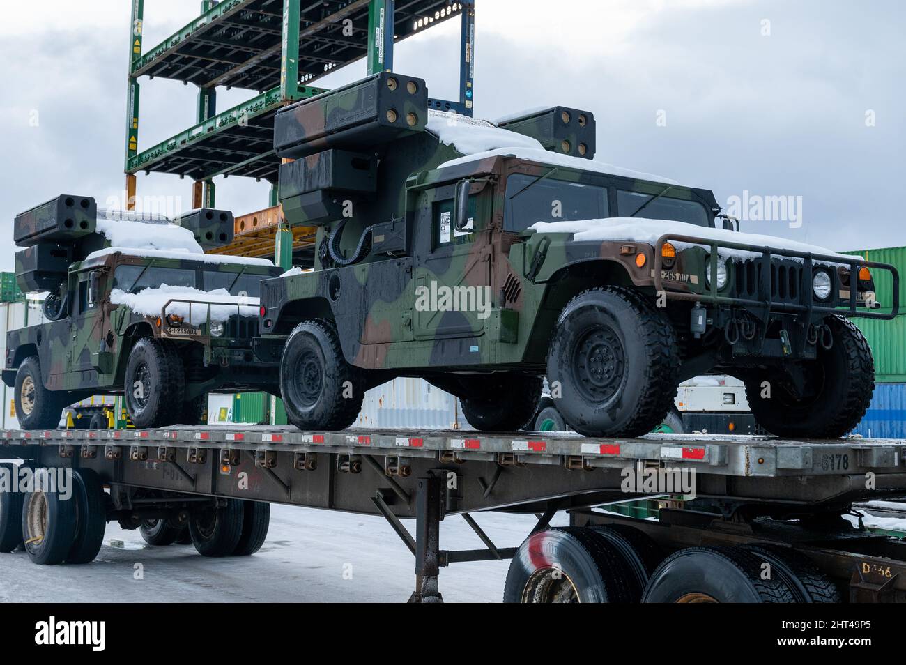 Two Avenger Air Defense Systems sit on a flatbed trailer at the Port of ...
