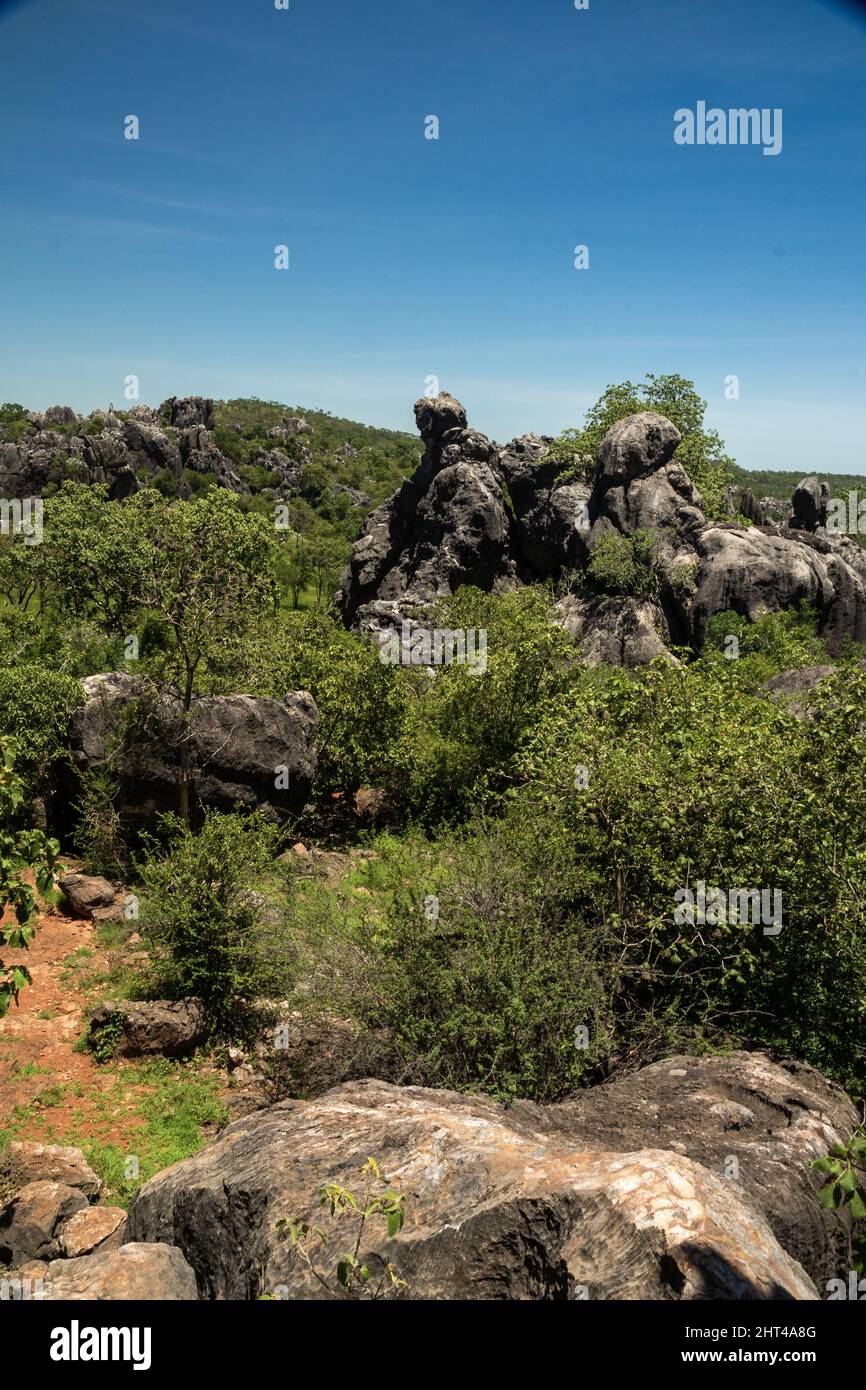 Vertical shot of big rocks in one of the natural Outback in Australia ...