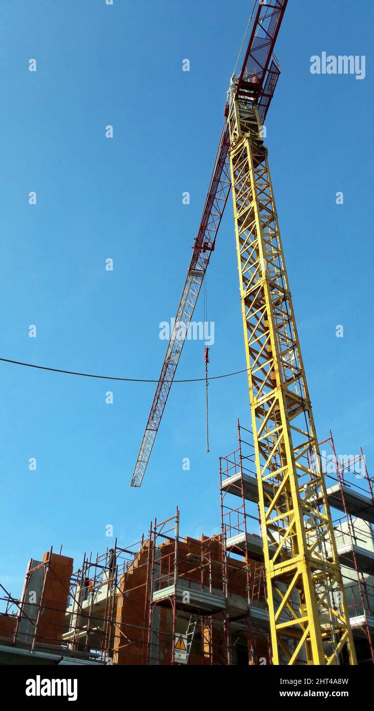 Closeup of a tower cranes used in heavy construction Stock Photo - Alamy