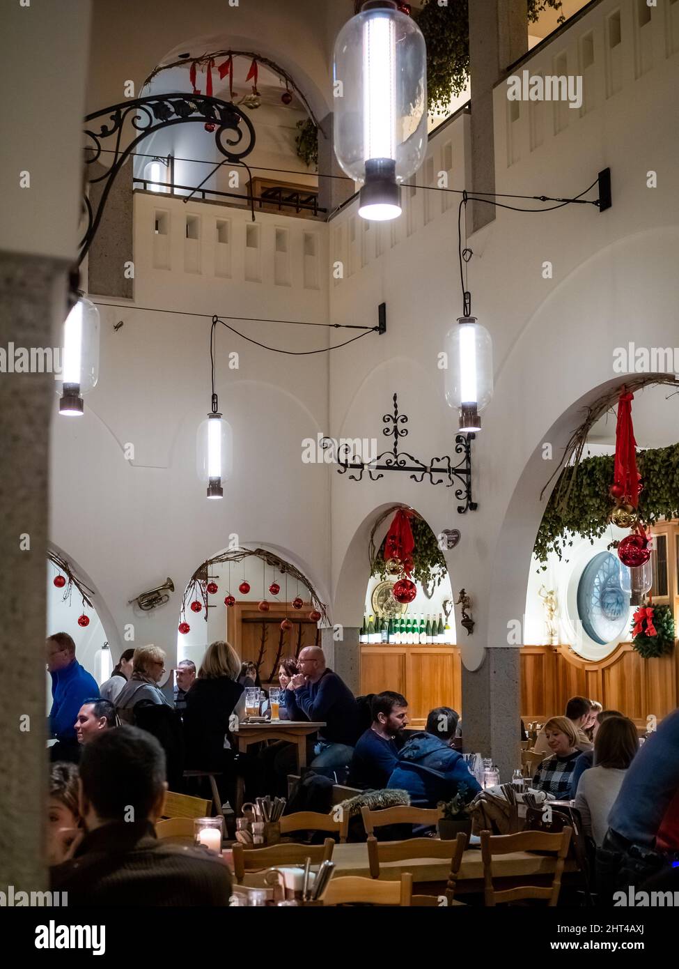 Interior view of Visitors in the famous beer hall restaurant in Munich ...