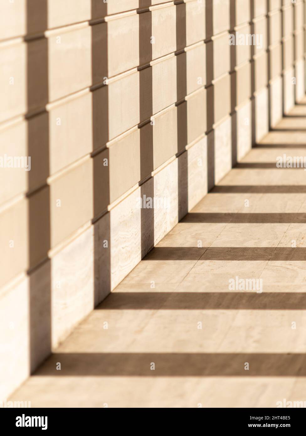 Vertical shot of striped shadows dropped on the floor and wall Stock ...