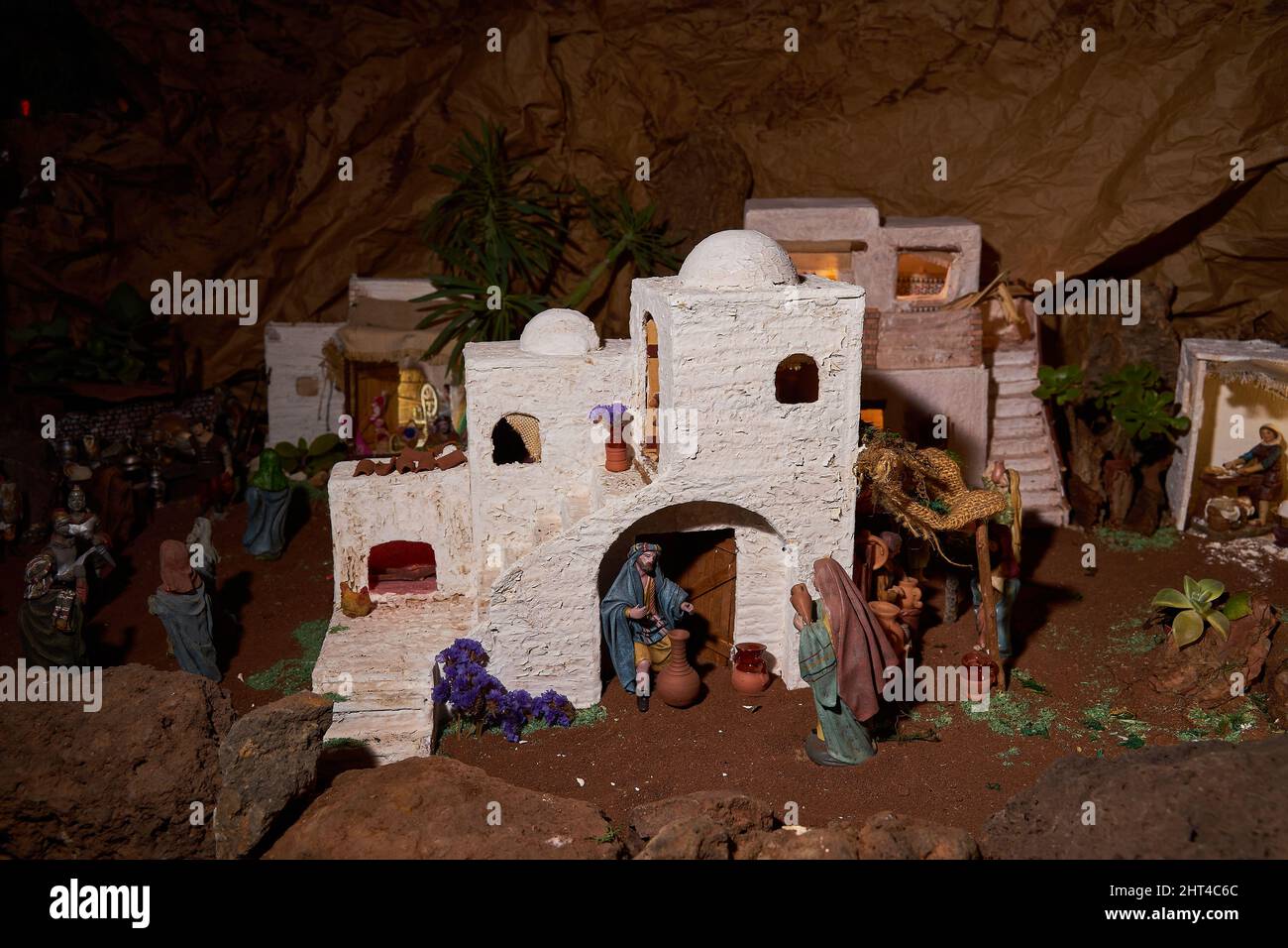 Domestic activity scene with small miniature realistic figures Stock ...
