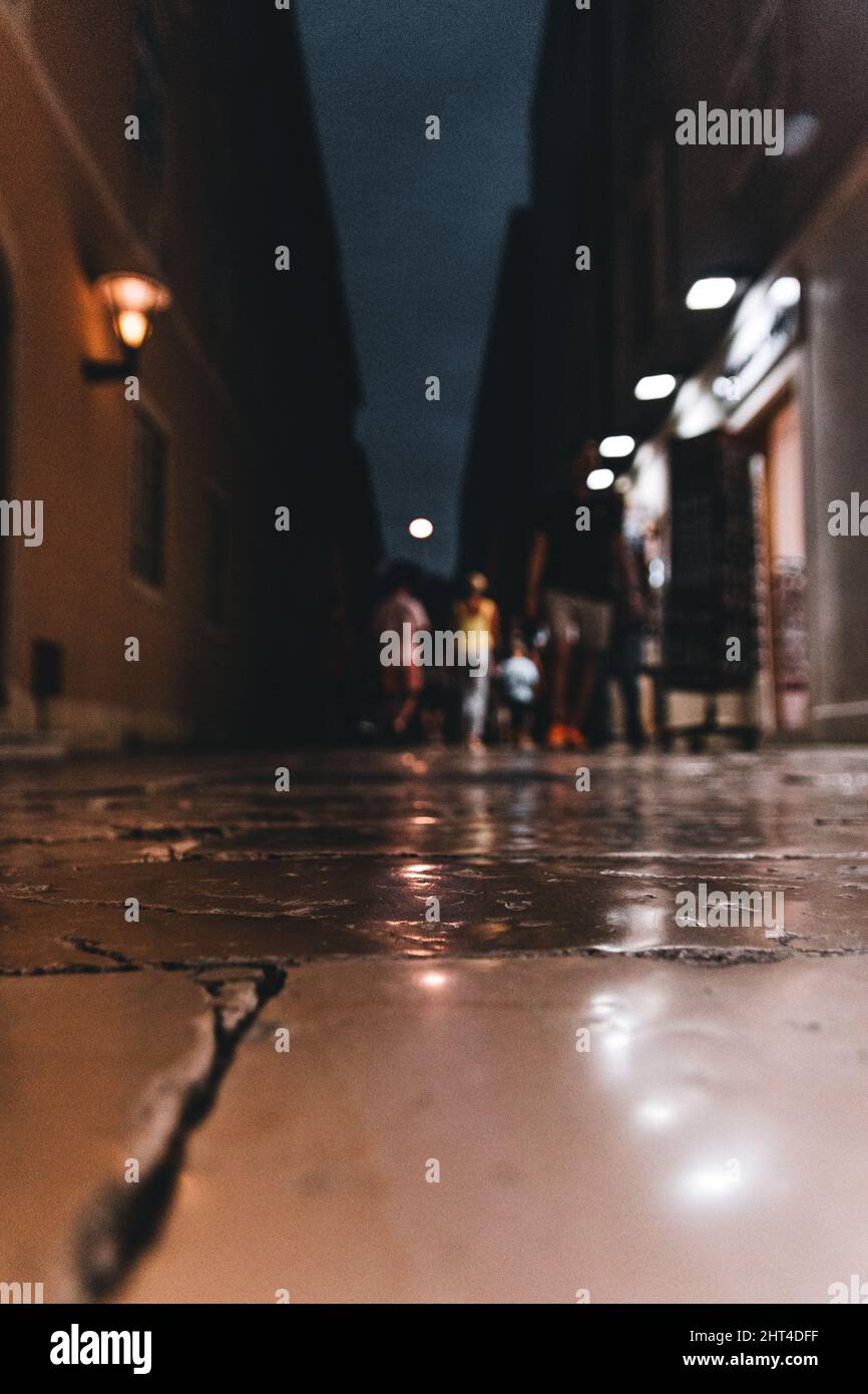 Vertical shot of rainy street at night Stock Photo - Alamy