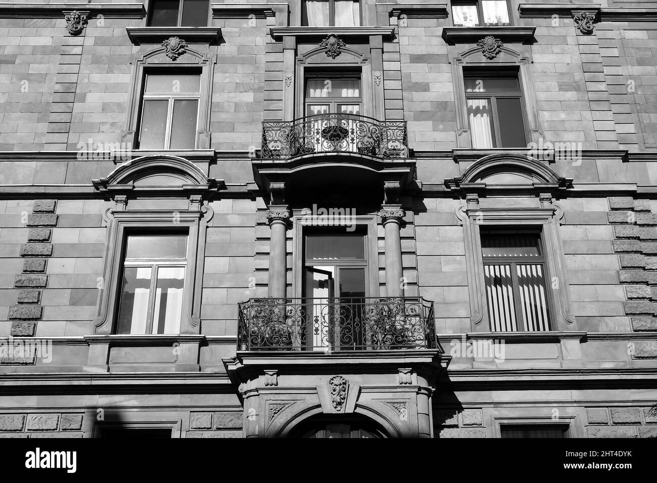 Residential building exterior with windows and balconies Stock Photo ...