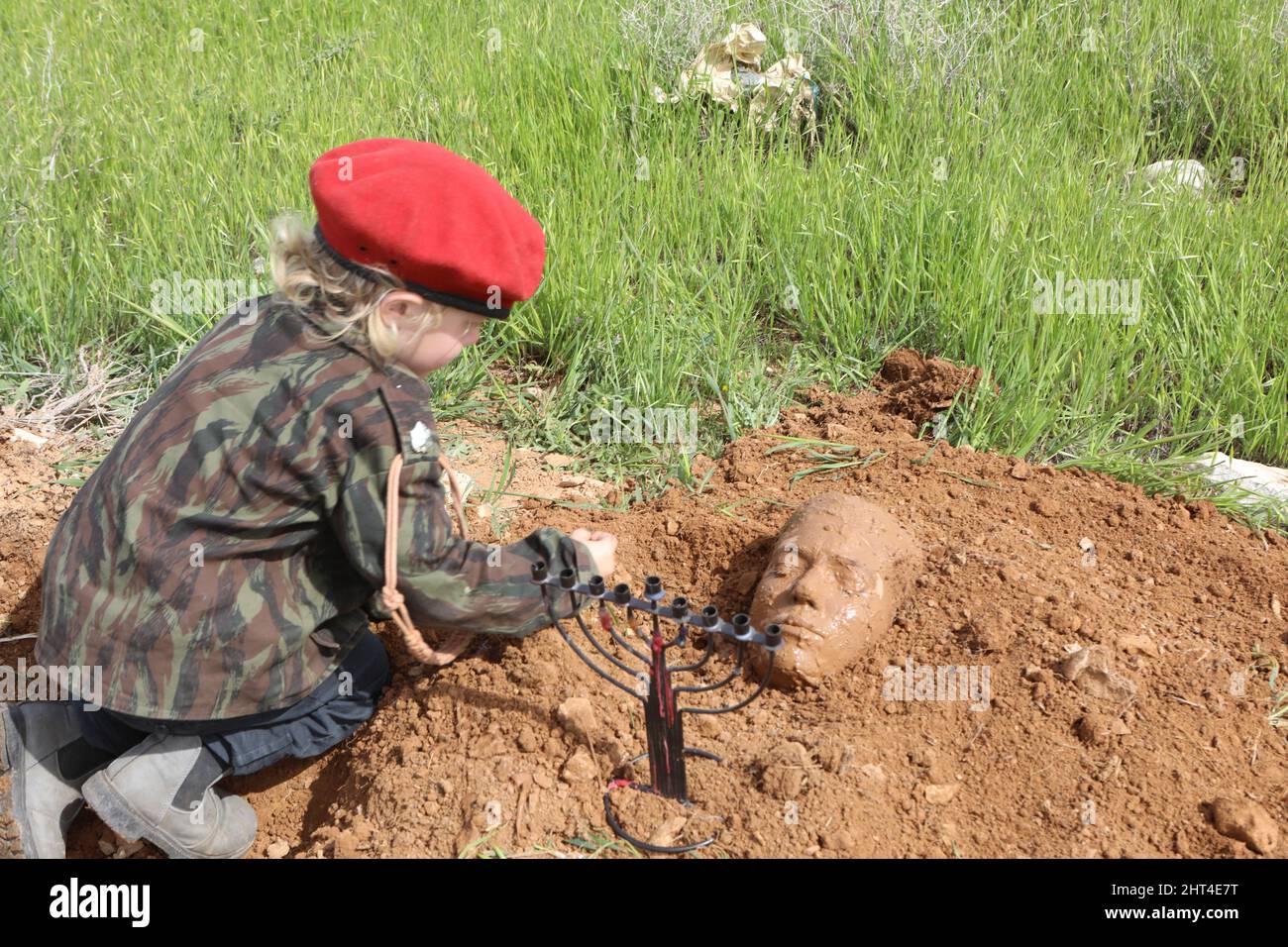 A woman buried in the ground A face covered in the ground Stock Photo ...