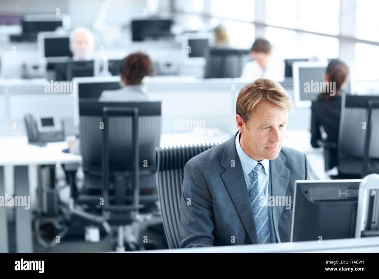 Businessman hard working desktop computer hi-res stock photography and ...