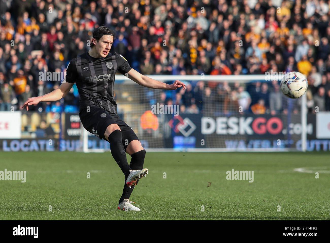 Alfie Jones #5 of Hull City puts a cross into the box Stock Photo - Alamy