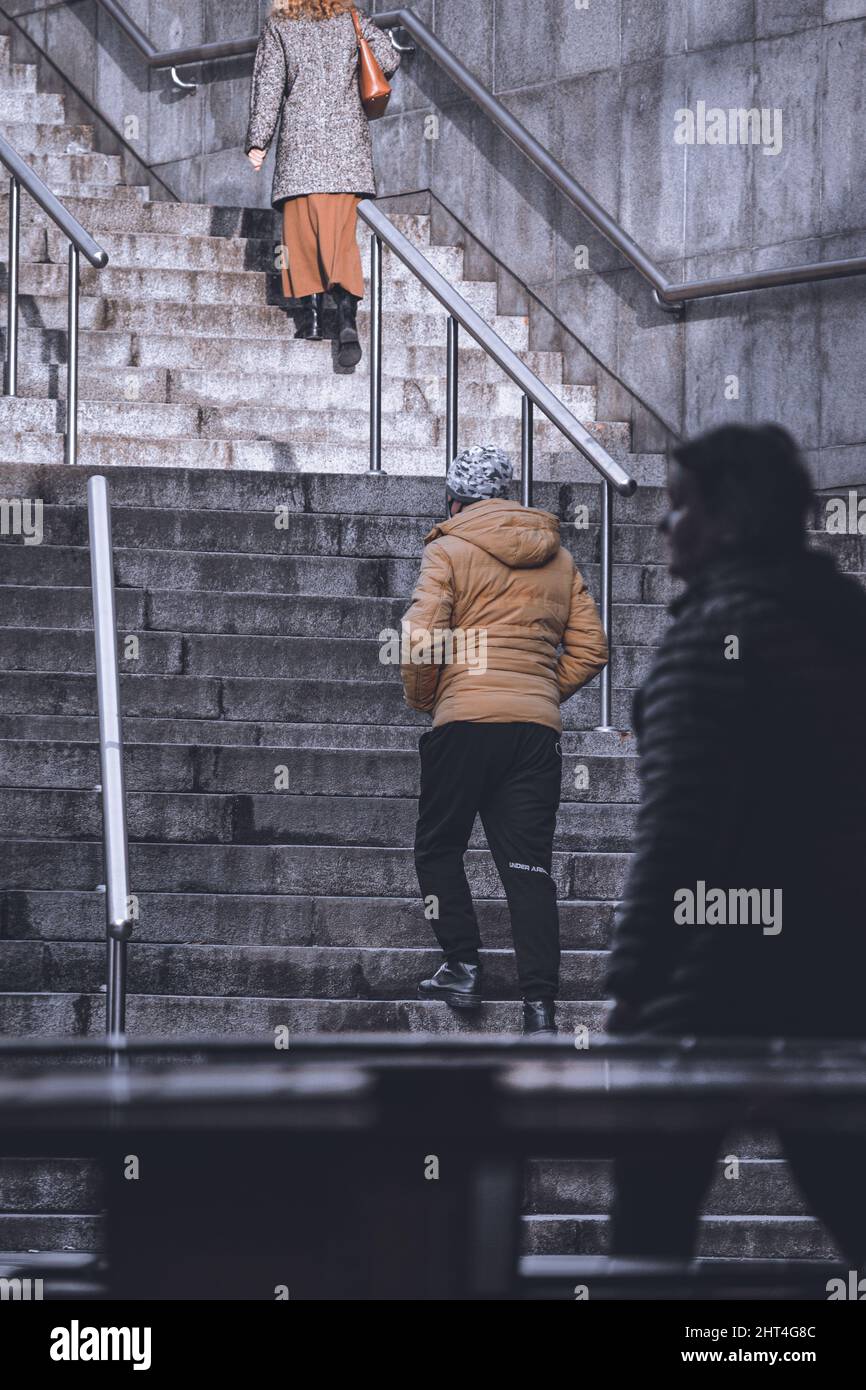 Business woman going upstairs hi-res stock photography and images - Alamy