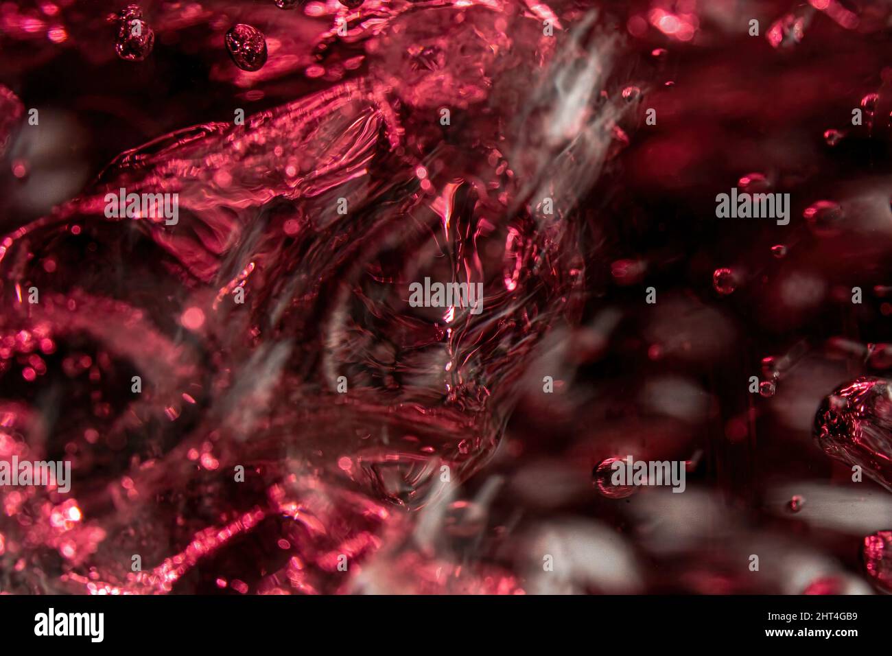 Closeup of red lights on the water on a dark background Stock Photo - Alamy