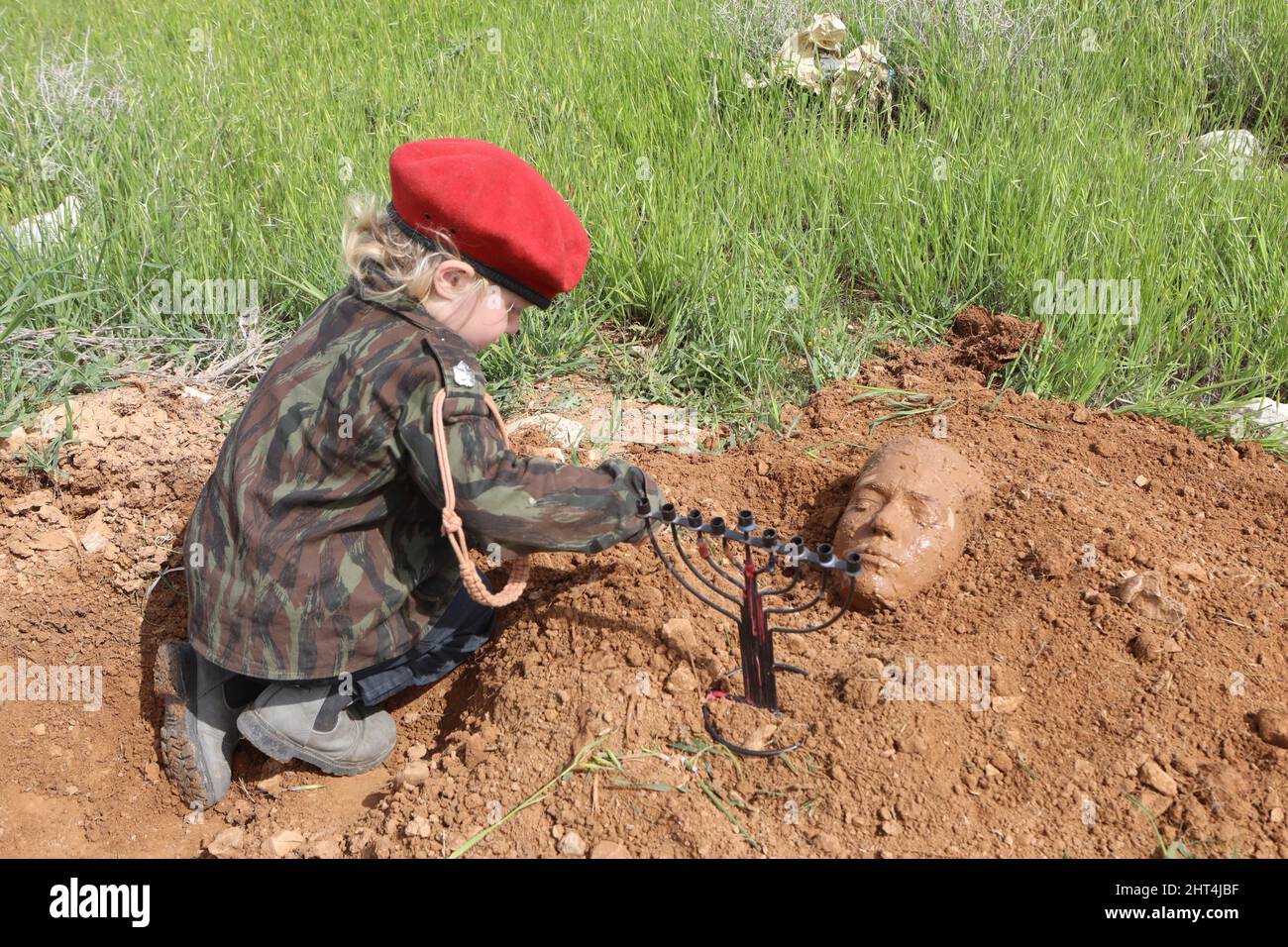 A woman buried in the ground A face covered in the ground Stock Photo ...