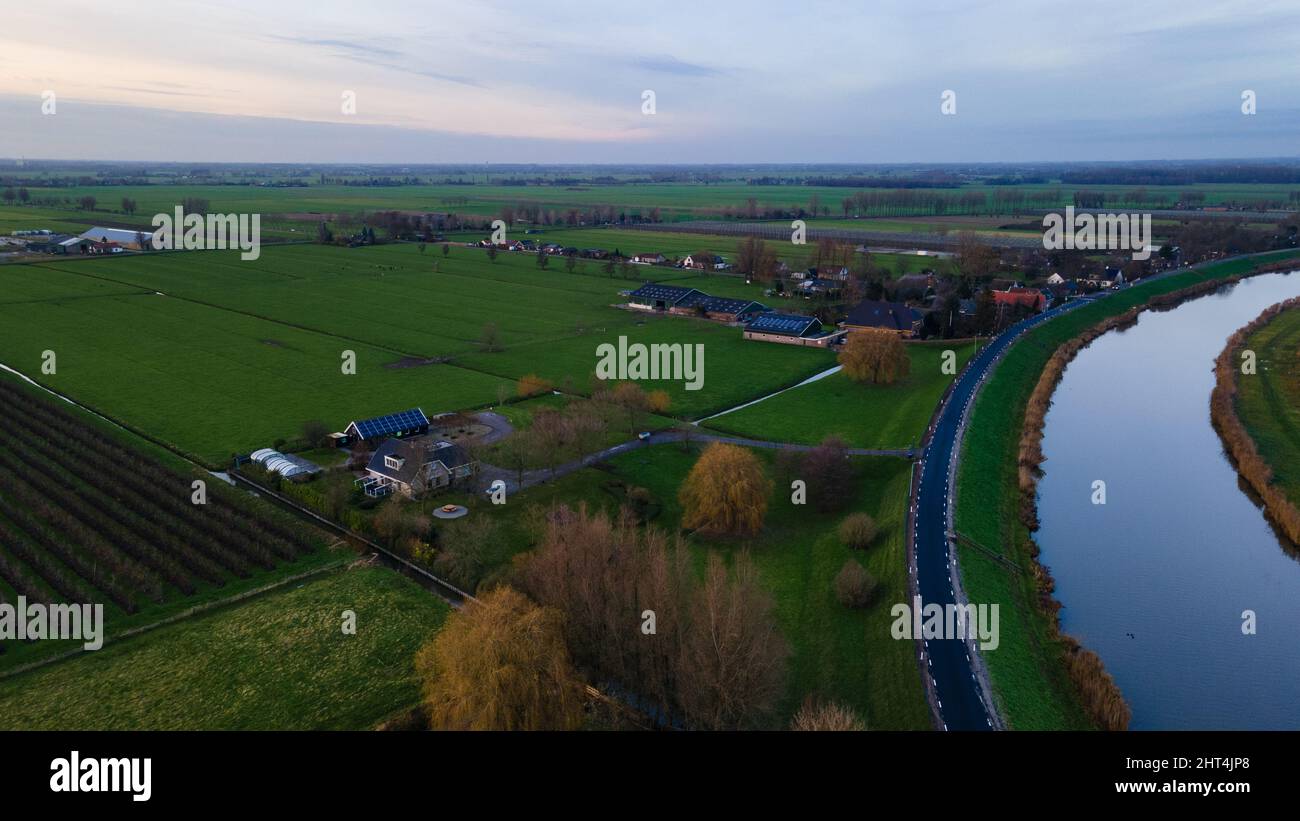 Aerial view of the Linge river and typical green Dutch polder landscape ...
