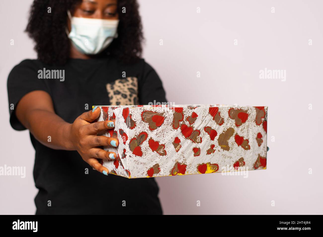 Lady receiving package hi-res stock photography and images - Alamy