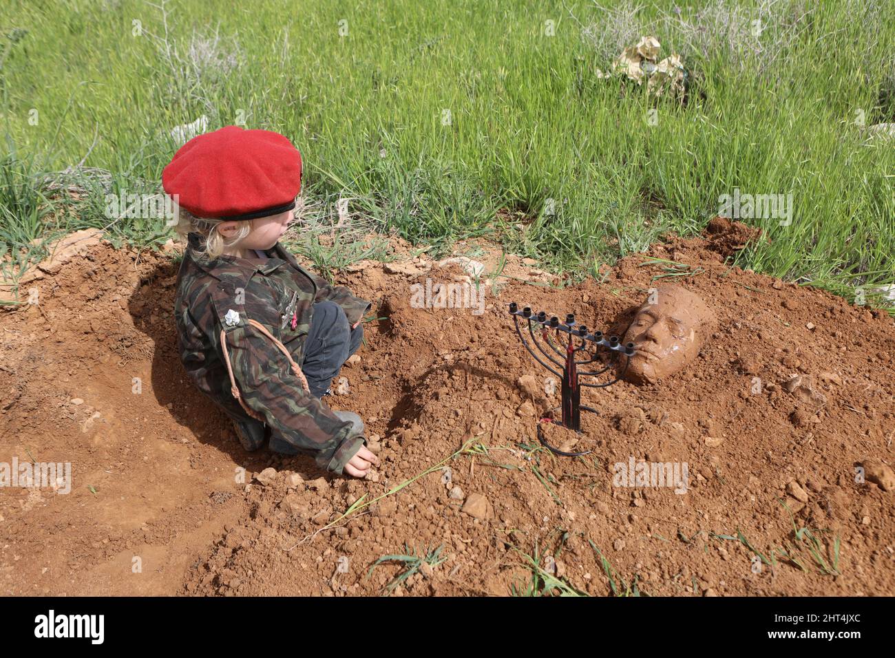 A woman buried in the ground A face covered in the ground Stock Photo ...