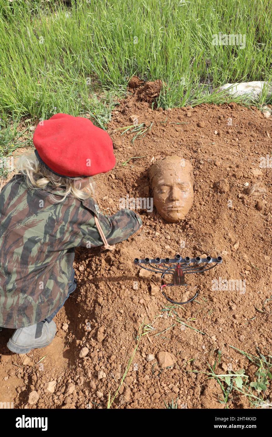A woman buried in the ground A face covered in the ground Stock Photo ...