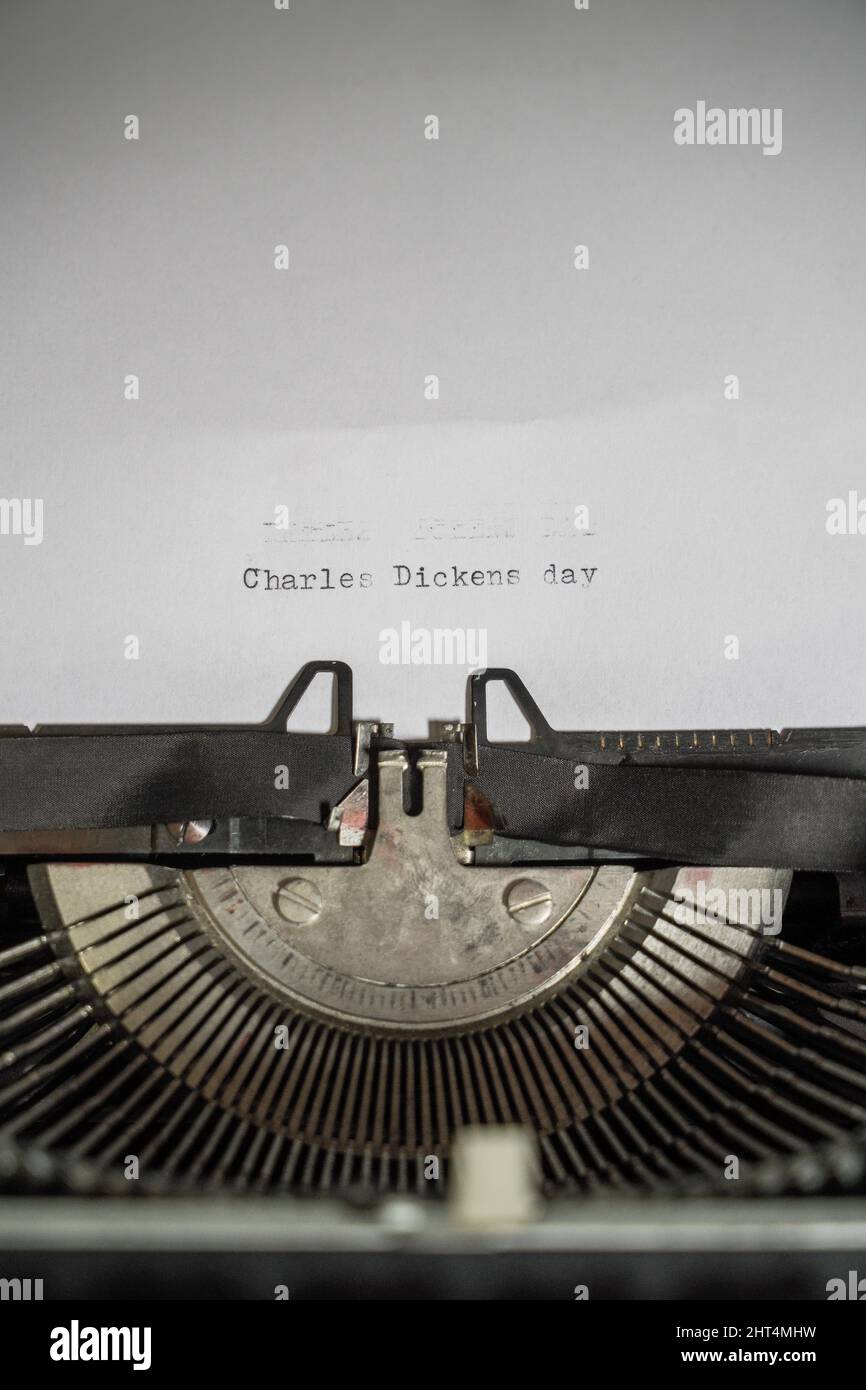 Charles Dickens day typed on vintage machine Stock Photo - Alamy