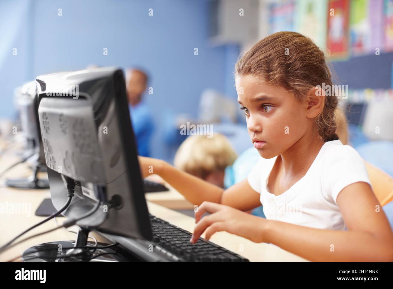 Wow, computer class is really interesting. A cute schoolgirl in ...