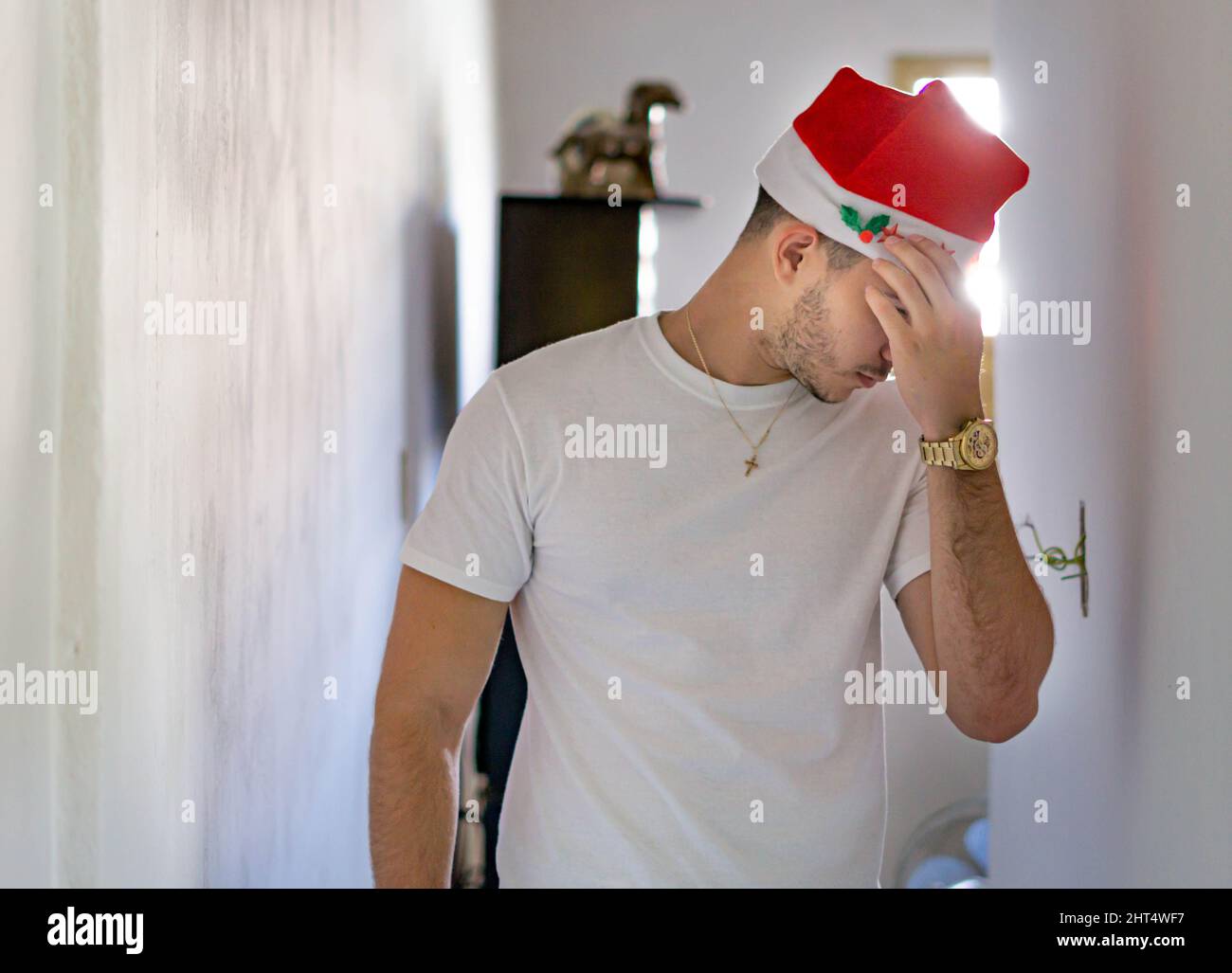 Native American male wearing a Christmas hat Stock Photo - Alamy