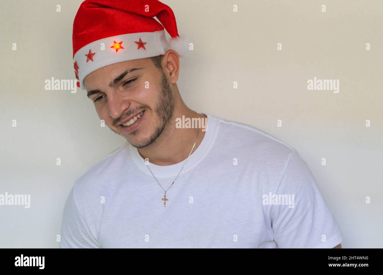 Native American male wearing a Christmas hat Stock Photo - Alamy