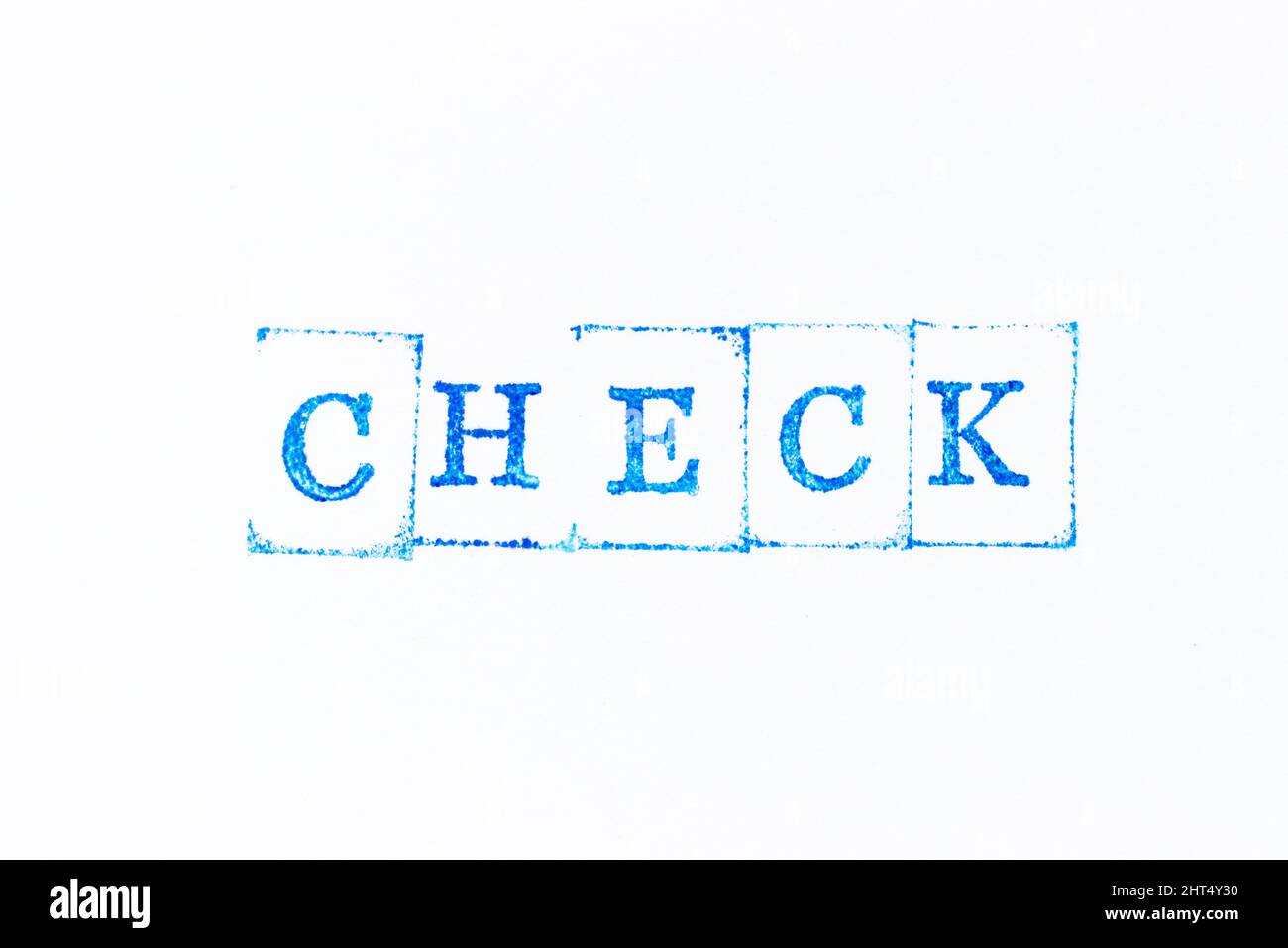 Blue color ink rubber stamp in word check on white paper background ...