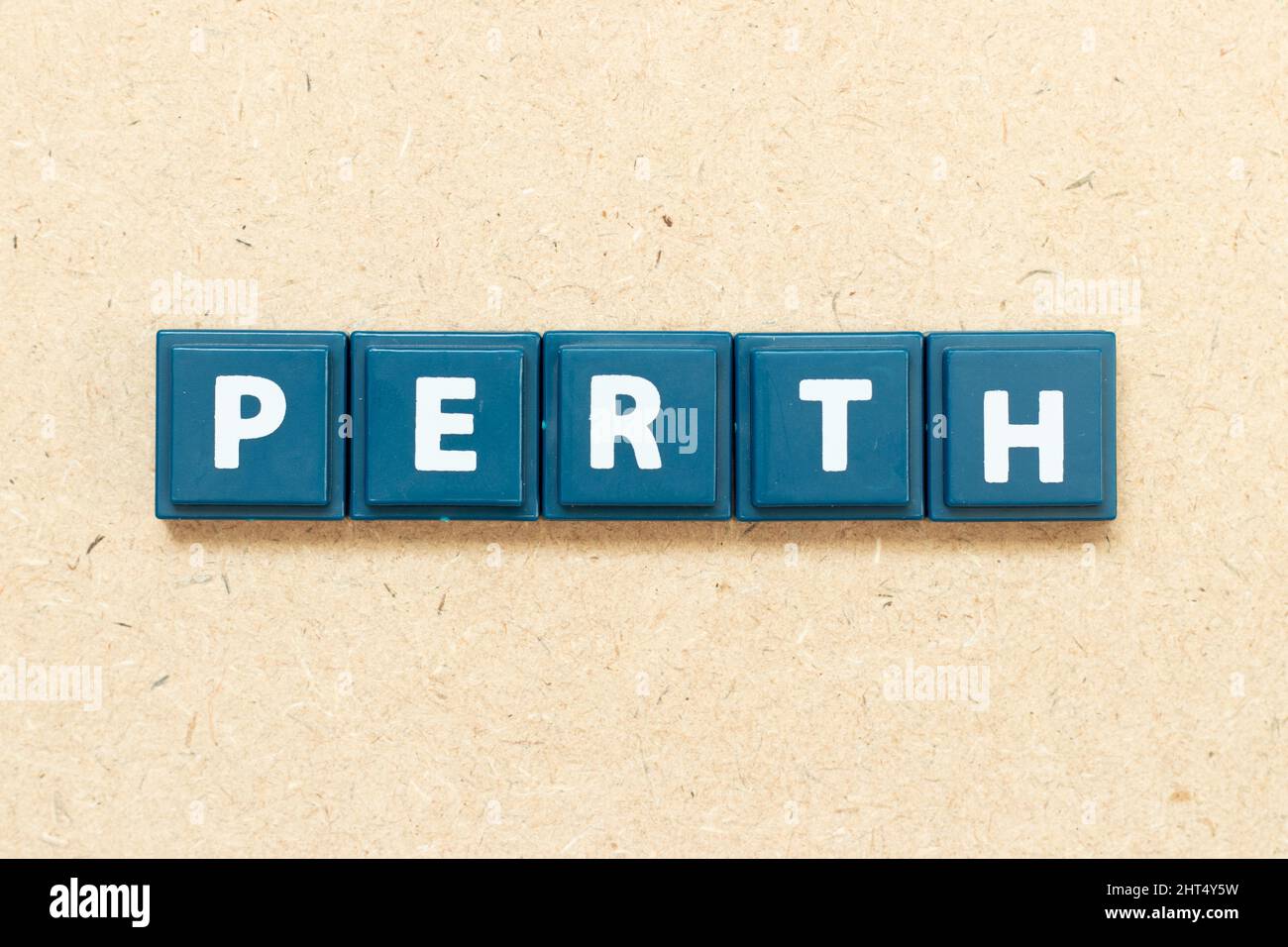 Tile alphabet letter in word perth on wood background Stock Photo - Alamy