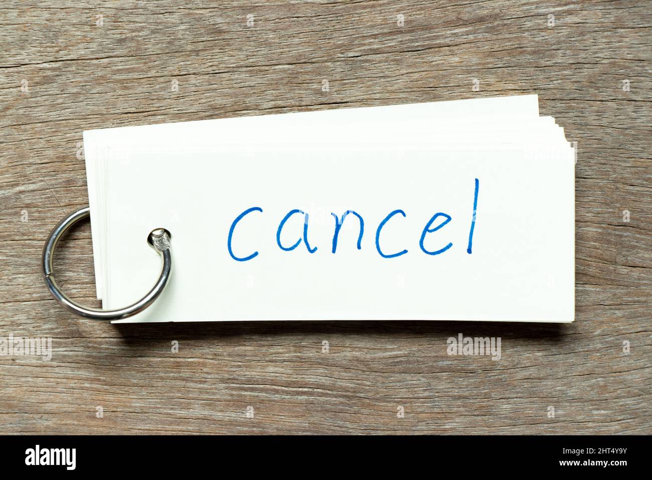 Flash card with handwriting word cancel on wood background Stock Photo ...