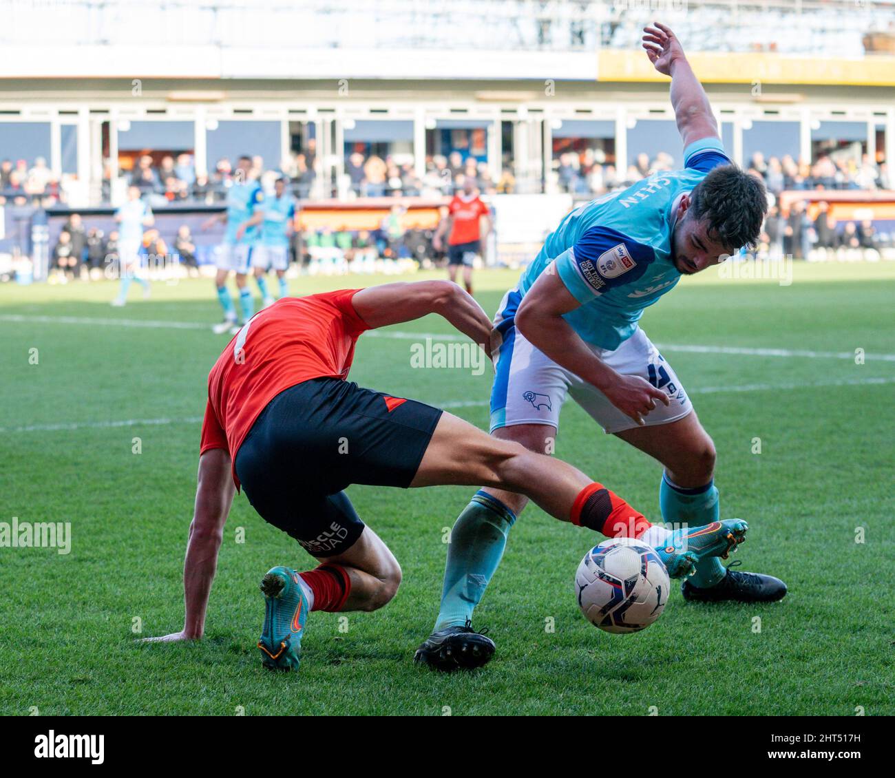 Luton, UK. 26th Feb, 2022. Harry Cornick #7 of Luton Town battles with ...