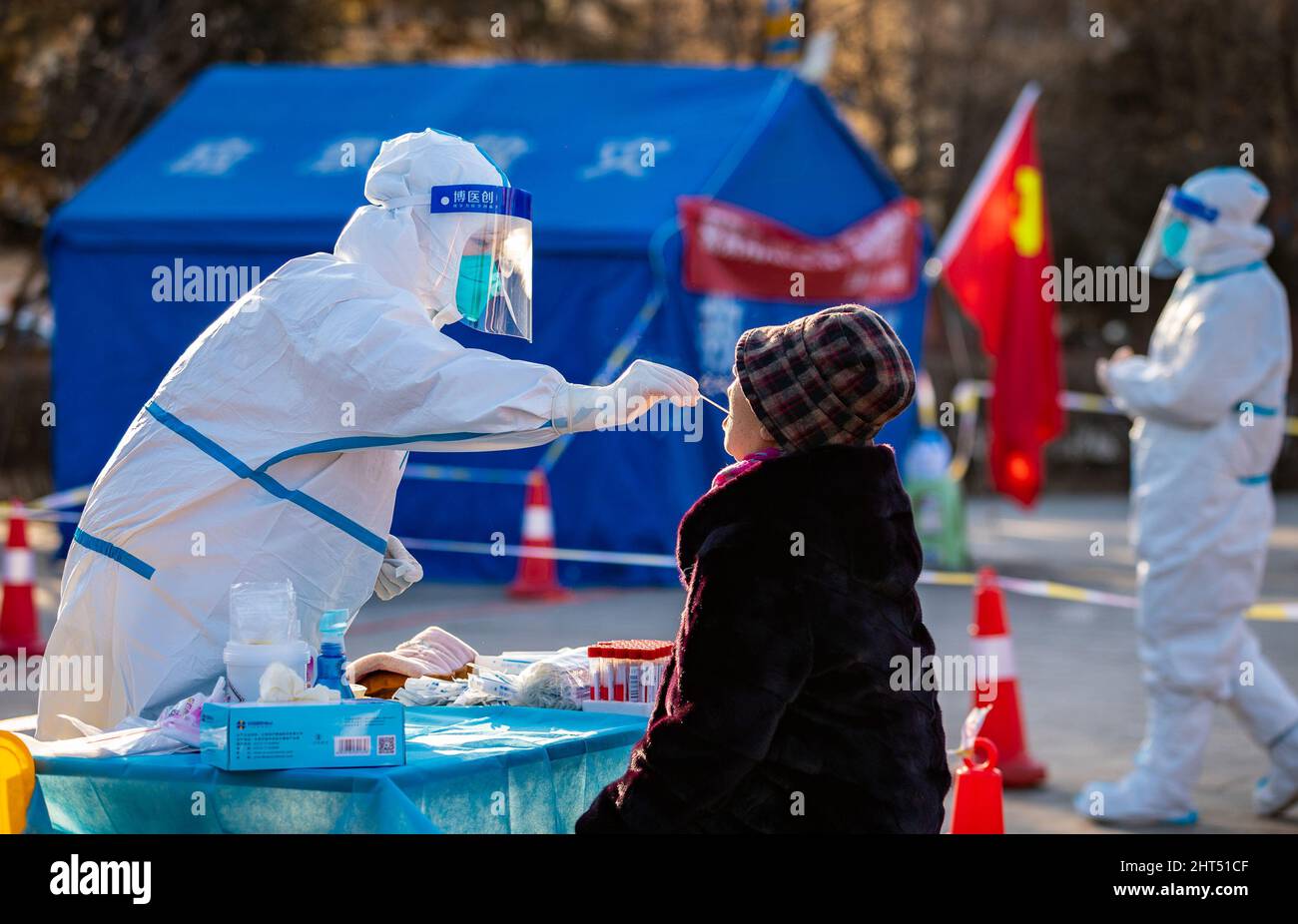 HOHHOT, CHINA - FEBRUARY 27, 2022 - A medical worker performs the ninth ...