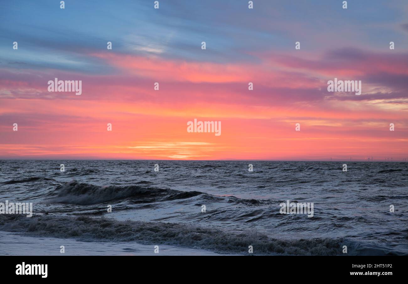 Mesmerizing view of a beautiful seascape at scenic sunset Stock Photo ...