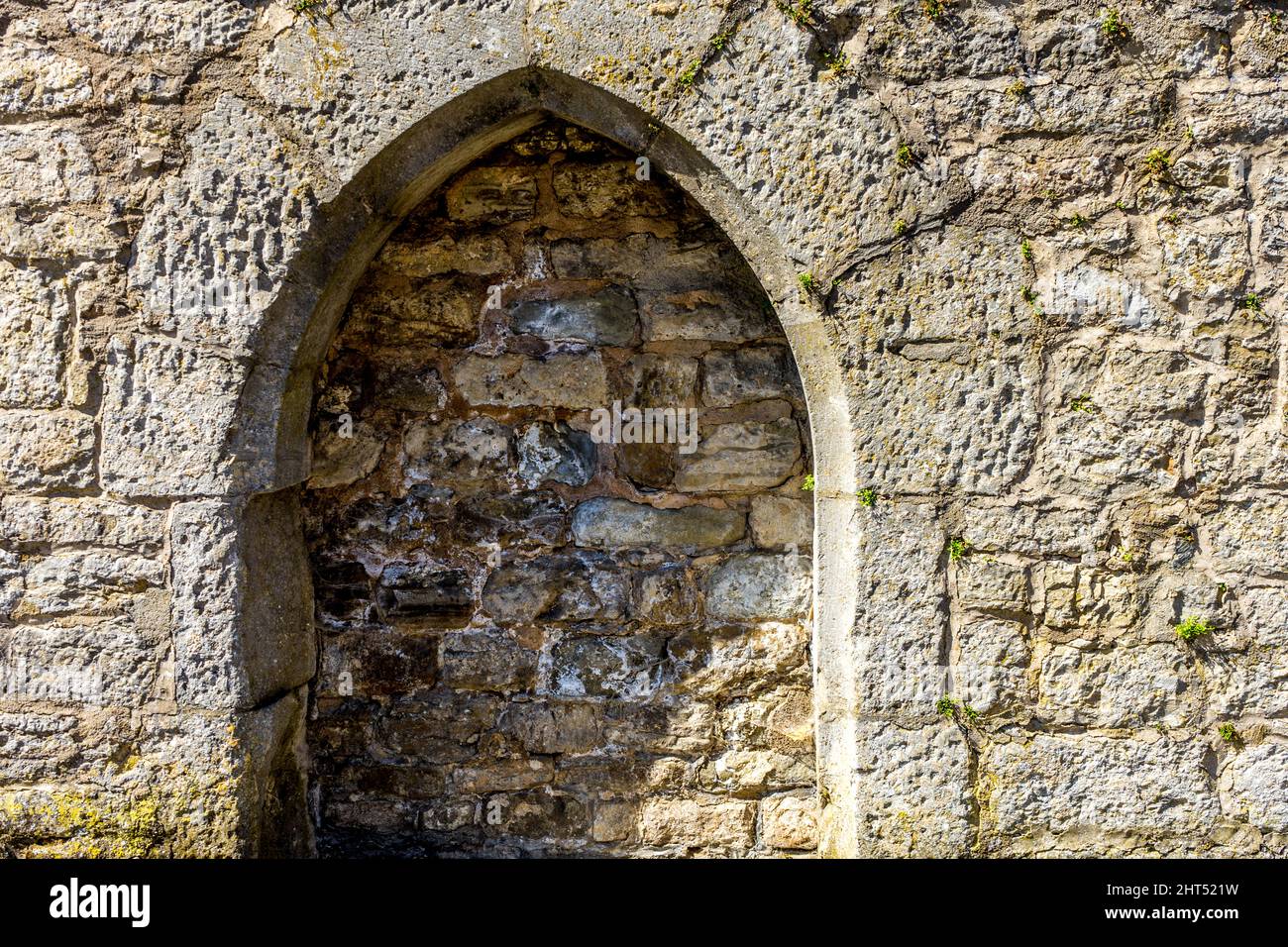 Old stone building with an arch Stock Photo - Alamy